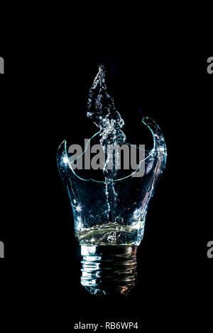 A closeup of a flash of light on a wet glass Stock Photo - Alamy