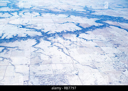 Dendritic river drainage pattern on snow covered prairie landscape ...