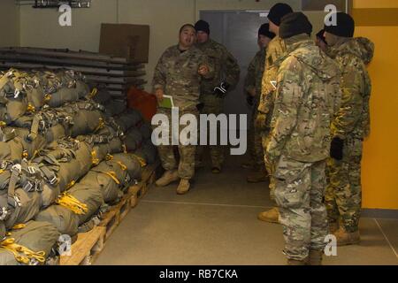A parachute riggers assigned to 601st Quartermaster Company, Brigade ...