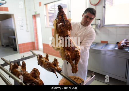 Roast suckling piglet piglets pig pigs in Botin Restaurant at ...