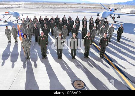 Members of the 867th Attack Squadron stand ready during a group photo ...