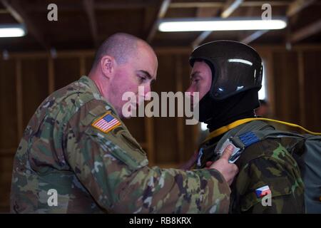 Sgt. Nathaniel Bier, 301st Psychological Operations Company, left, and ...