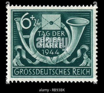German historical stamp: Green postage stamp with overprint with a face ...