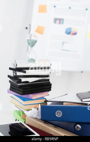Stack of office folders on light green background, space for text Stock ...