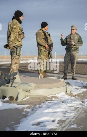 Airmen from the 90th Missile Security Forces Squadron conduct the first ...