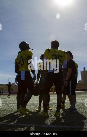 U.S. Army Reserve Soldiers huddle up around a First Army observer coach ...