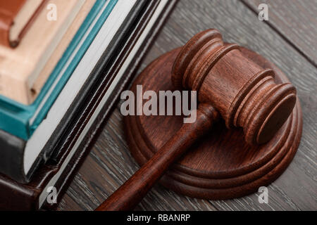 Wooden judges gavel on table close up Stock Photo - Alamy