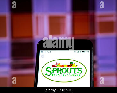 Sprouts Farmers Market Supermarket company logo seen displayed on smart ...