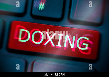 Doxing computer key Stock Photo - Alamy