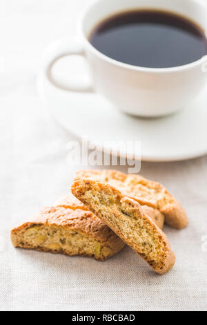Cup of coffee with amaretti (Italian biscuits) on rustic wooden ...