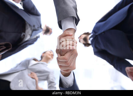 handshake bottom view Stock Photo - Alamy