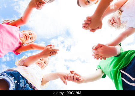 Adorable latin brother and sister hugging at the park Stock Photo - Alamy