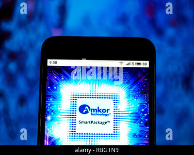 Amkor Technology Semiconductor manufacturing company logo seen ...