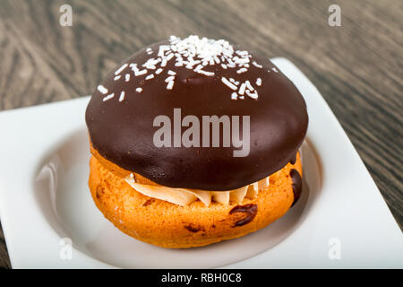 Bouchee cake with chocolate Stock Photo - Alamy