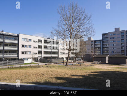 Green spaces and playgrounds between apartment blocks give friendly ...