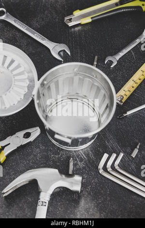 decluttering and home renovation concept: set of DIY tools and garbage ...