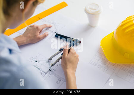 architect engineer working on house blueprint of real estate project at ...