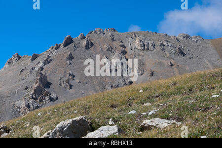 Sharp and dangerous rocks composed of sedimentary rocks Stock Photo - Alamy