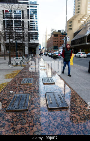 The 100 Workers memorial on Front Street, Toronto Stock Photo - Alamy