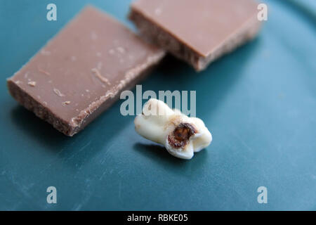Close up of bad chocolate bar isolated on white background Stock Photo ...