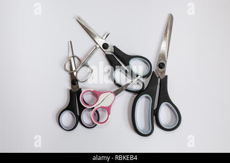 Various sizes of closed scissors isolated on white background Stock ...