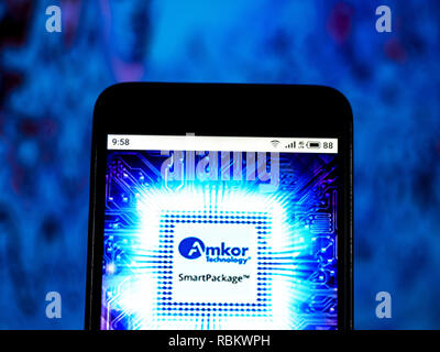 Amkor Technology Semiconductor manufacturing company logo seen ...