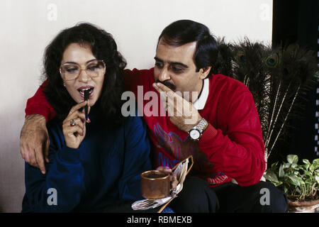Priya Tendulkar and Karan Razdan sitting on sofa, India, Asia Stock ...