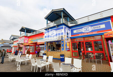 A view of the seafront shops and amusement arcade at Mundesley-on-Sea ...