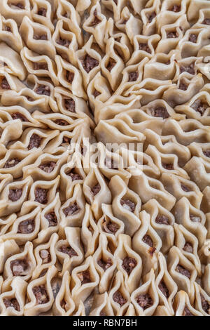 Delicious Turkish Ravioli Tepsi Manti. Turkish traditional Kayseri ...