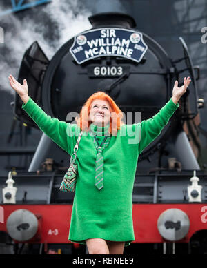 Lady Judy McAlpine stands in front of the Flying Scotsman, that has ...