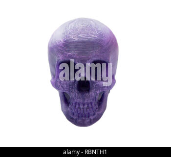 Prototype of human skull printed on 3D printer from molten purple ...