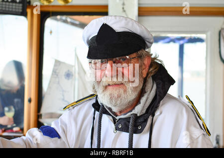 Ship navigation, experienced captain, old sea dog with grey hair and ...