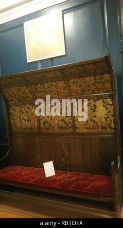 A wooden carved bench by William Morris 02 Stock Photo - Alamy