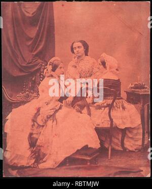 Three women of the Claudet family seated in a studio, showing early ...