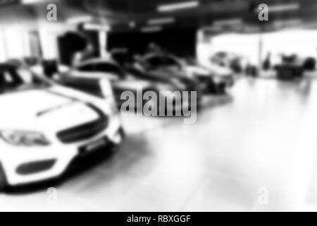 Blurred car dealership store bokeh background. Cars soft lightning ...