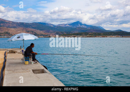 Greek angler at Lixouri, Kefalonia, Greece Stock Photo - Alamy