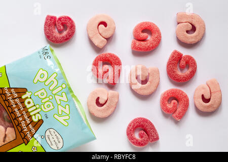 M&S phizzy pig tails soft gums made with fruit juice and a fizzy hint removed from packet spread ...