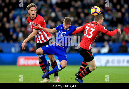 Leicester City's Jannik Vestergaard (centre) and Wout Faes (right ...