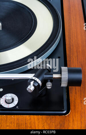 Side view of vintage turntable vinyl record player isolated on white ...