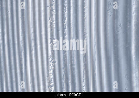 perfectly groomed empty ski run with snow cannon which is making powder ...