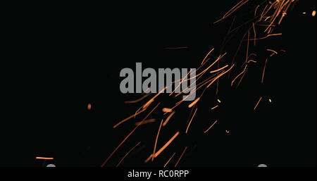 hot sparks falling from above black background, wide photo Stock Photo ...