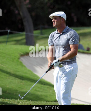 Bryson DeChambeau hits from the fairway on the 15th hole during the final round at the Masters ...