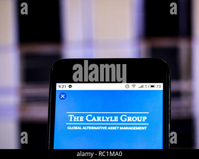 The Carlyle Group Private equity company logo seen displayed on smart ...