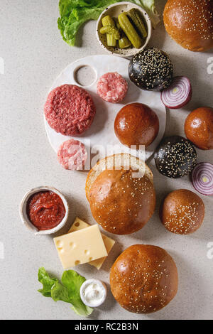 Homemade burgers with cutlet beef, cheese, bacon, french fries and ...