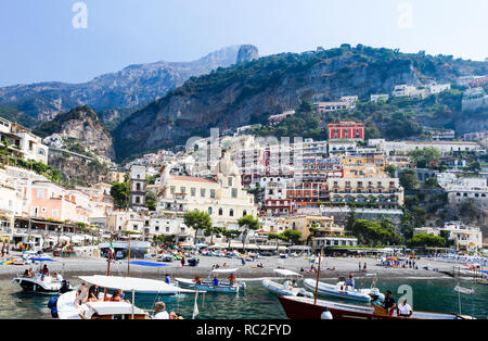 Tourist ships in visitfamous and picturesque port in Positano. Italy ...