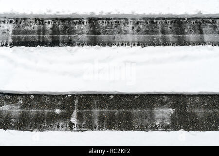 A cleared walkway after a winter storm and deep snowfall in Sedona ...