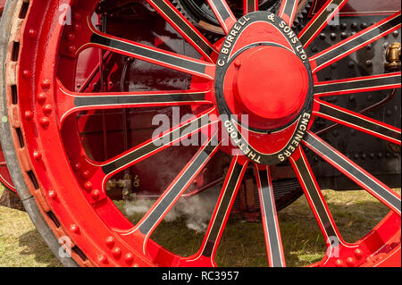Close up of the spokes of a traction engine wheel showing the detail ...