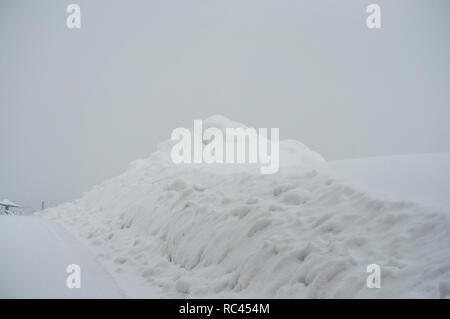 Mounds of snow. Big snow cyclone in Bavaria. Winter view background ...