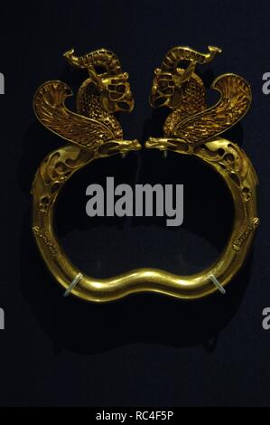 Gold griffin-headed armlet from the Oxus treasureAchaemenid Persian ...