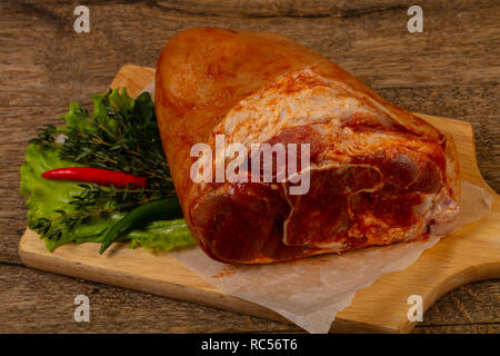 Raw pork knuckle marinated for cooking Stock Photo - Alamy